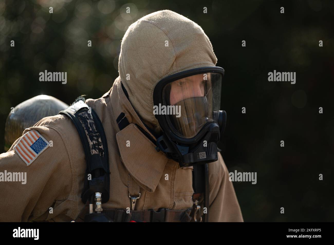 U.S. Air Force Airman 1st Class Kyle Gunderson, a firefighter assigned ...