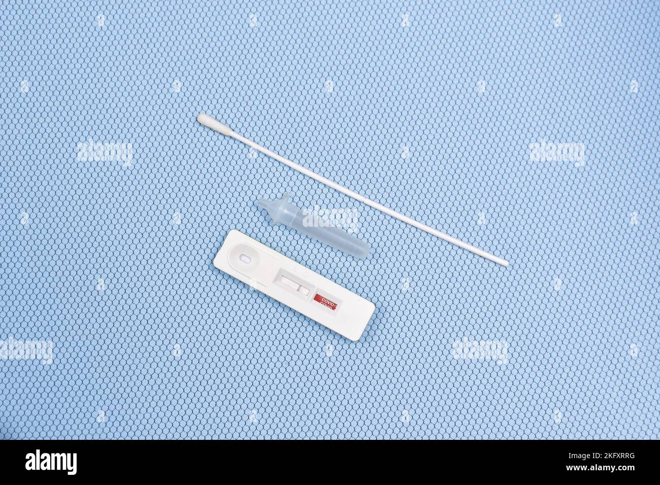 Antigen test kit (ATK) Covid-19 negative test result on light blue ...