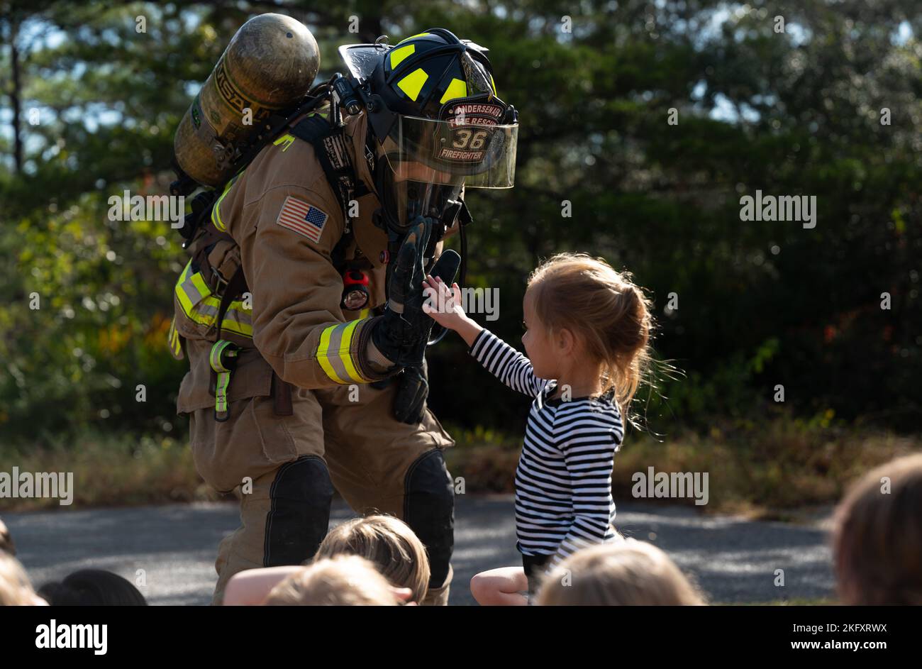 U.S. Air Force Airman 1st Class Kyle Gunderson, a firefighter assigned ...