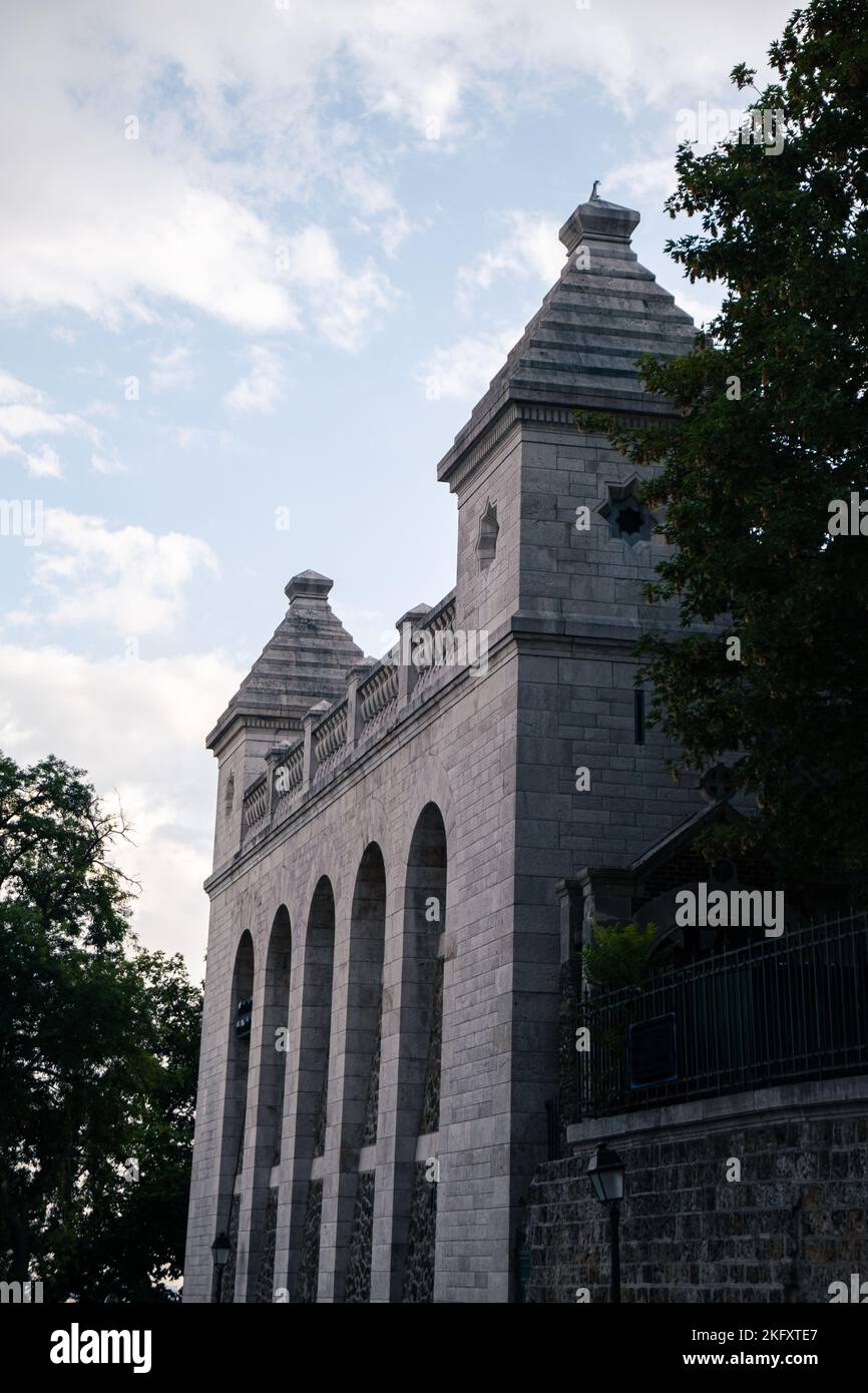 The outer stone wall of the Montmartre reservoir at Square Nadar in ...