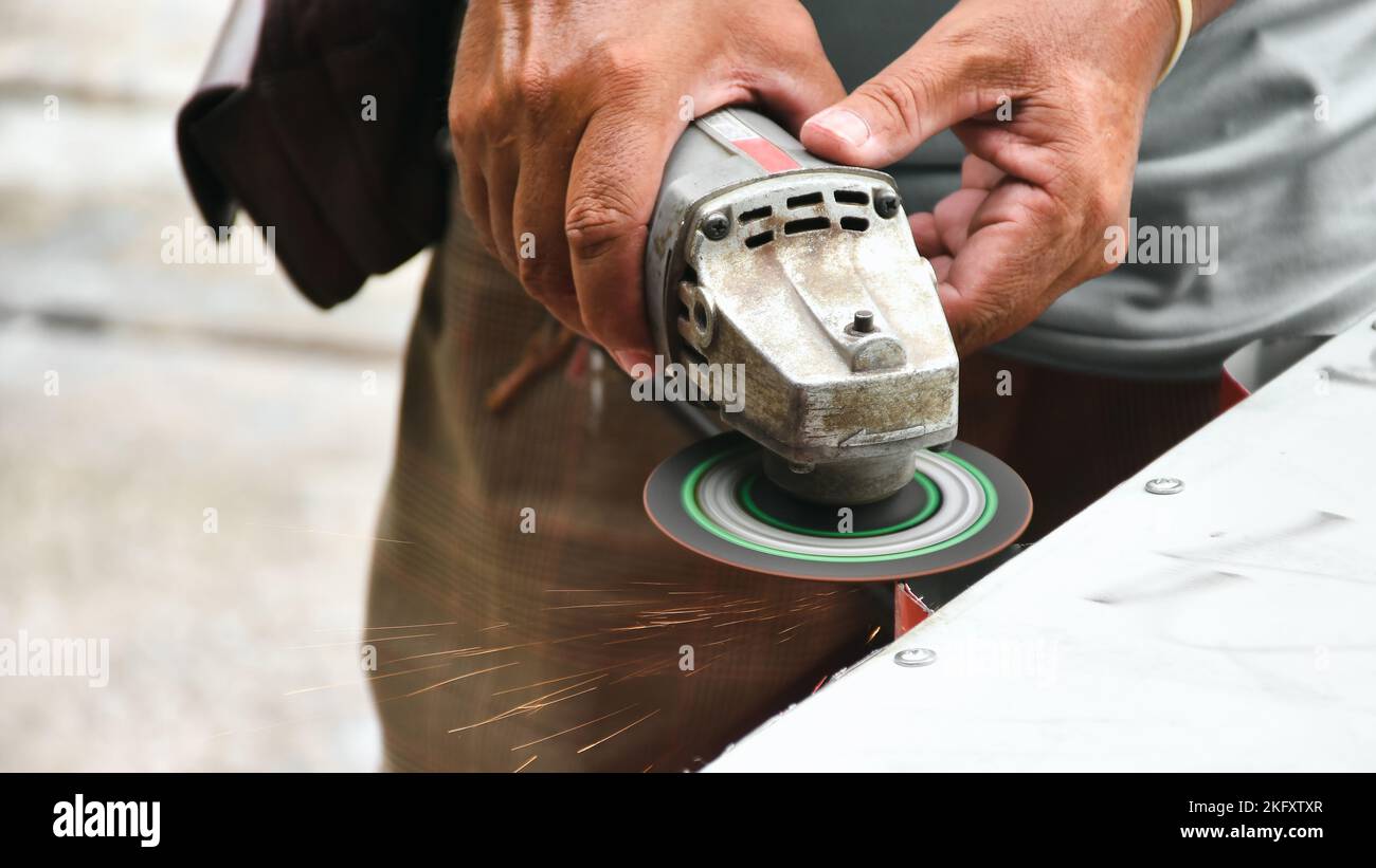 Worker grinding steel metal sheet hi-res stock photography and images ...