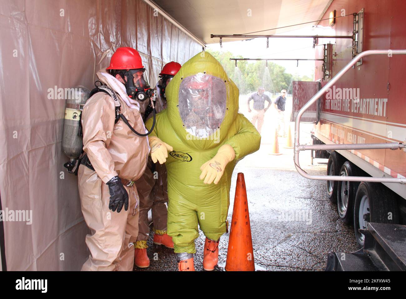 After exiting the building where the simulated threat was located, a ...