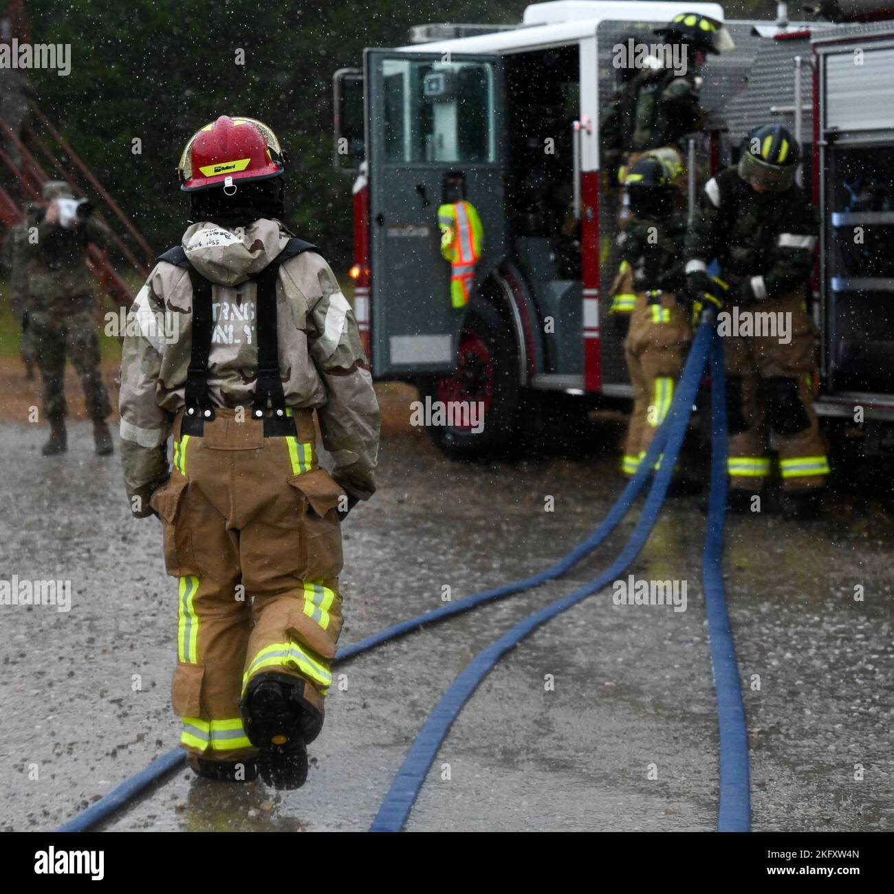 U.S. Air Force firefighter, assigned to 633d Civil Engineer Squadron ...