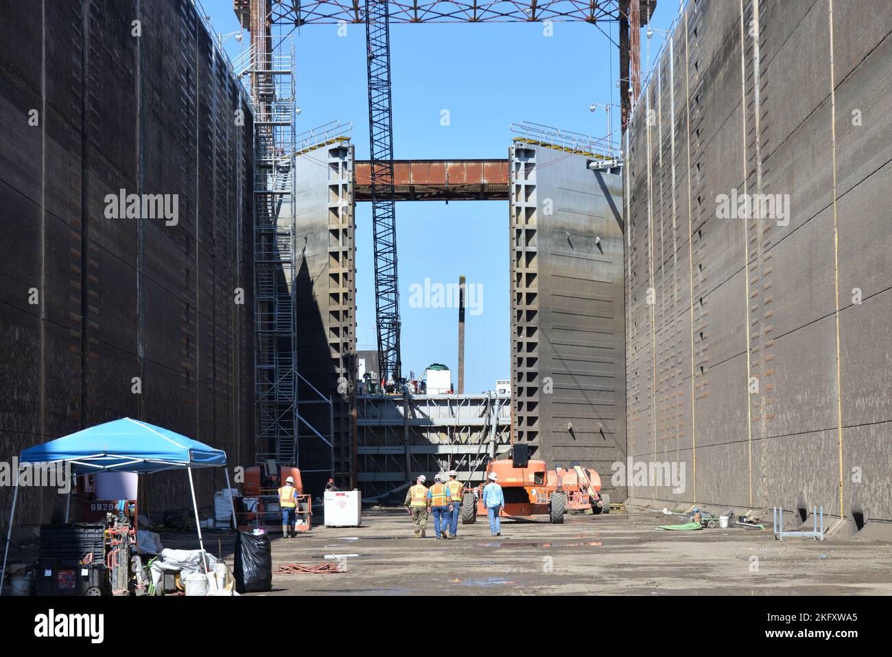 U.S. Army Corps of Engineers personnel inspect the dewatered Old River ...