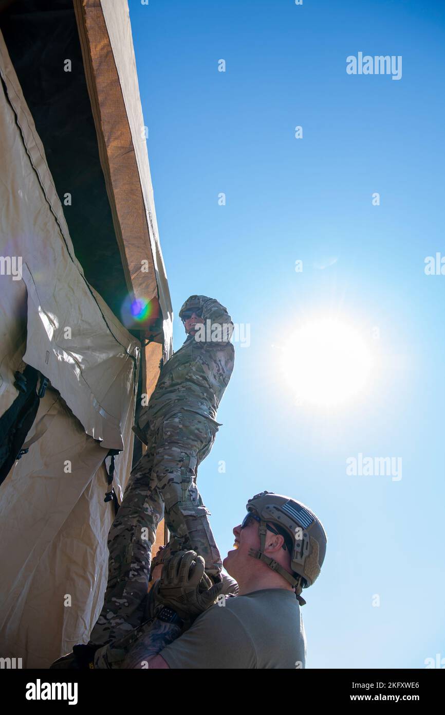 Tech. Sgt. Stephanie Eck, top, a 921st Contingency Response Squadron squad leader, finishes ...