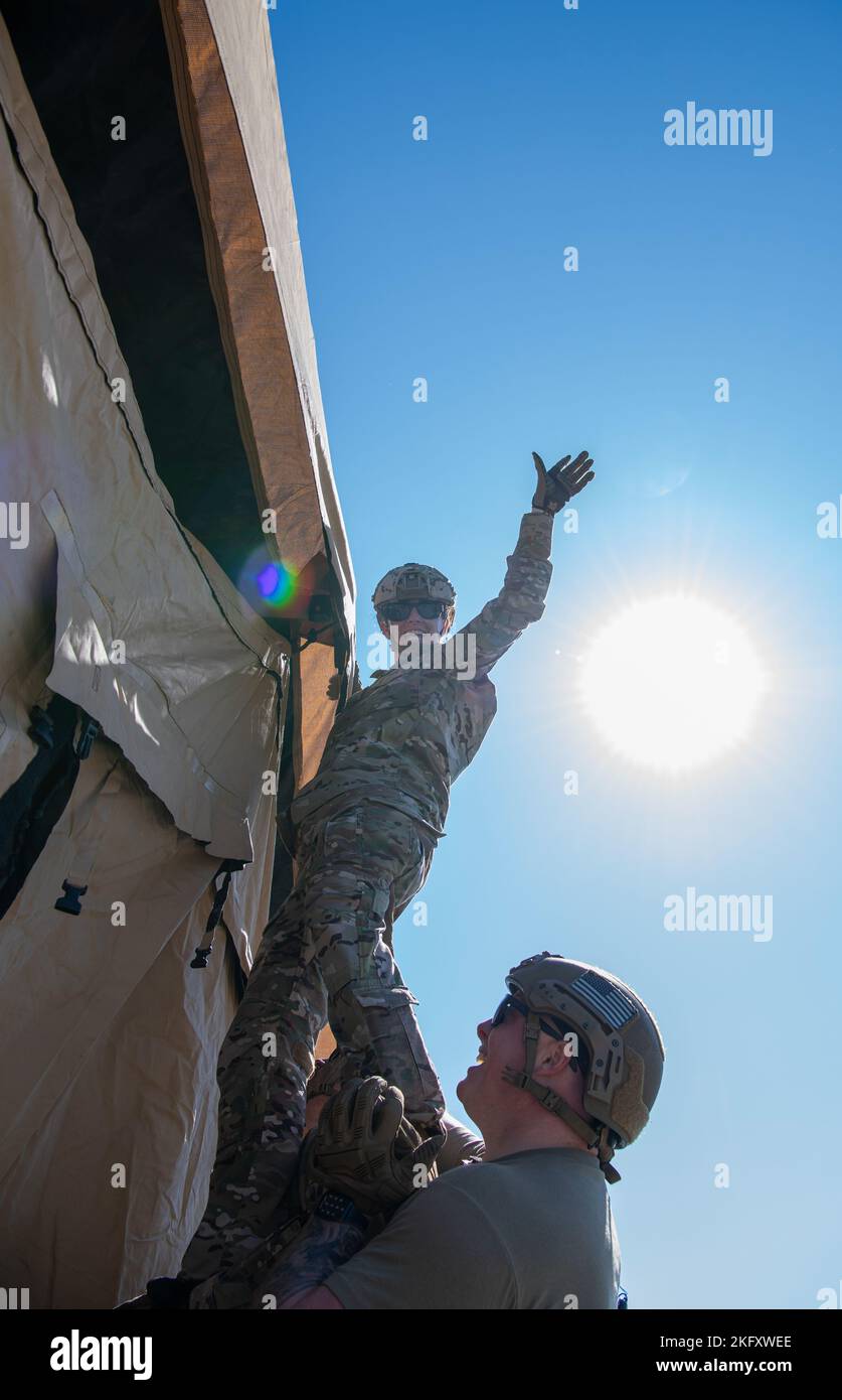 Tech. Sgt. Stephanie Eck, top, a 921st Contingency Response Squadron squad leader, finishes ...