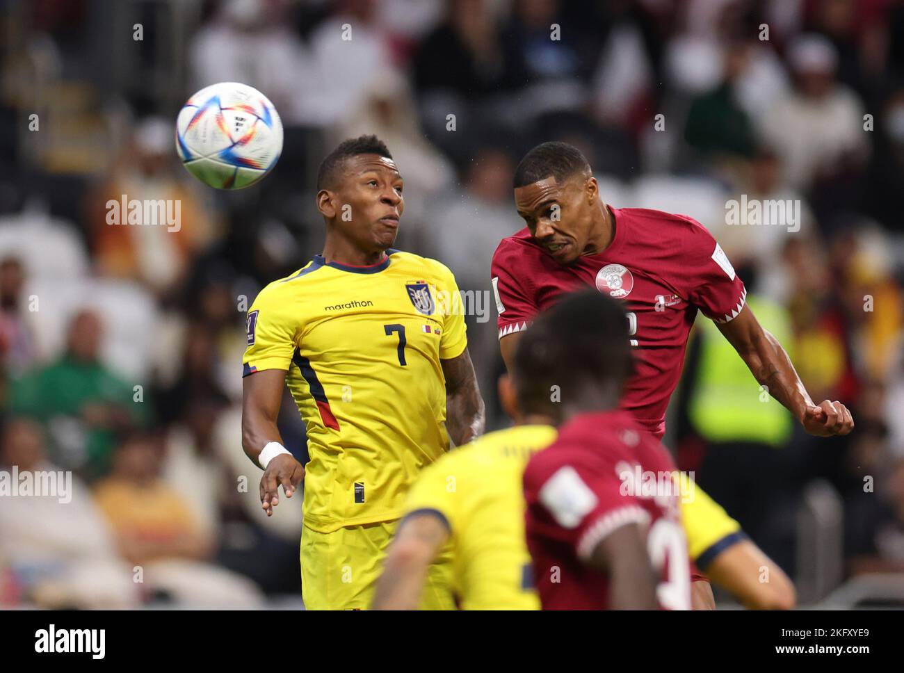 Al Khor, Qatar. 20th Nov, 2022. Pervis Estupinan (L) of Ecuador vies ...