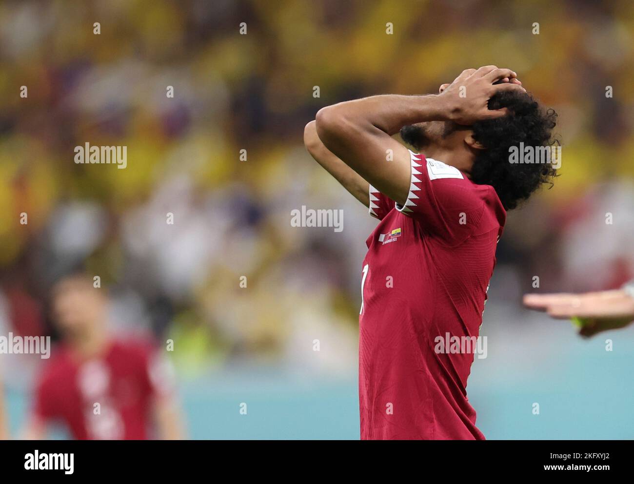 Al Khor, Qatar. 20th Nov, 2022. Akram Afif of Qatar reacts during the ...