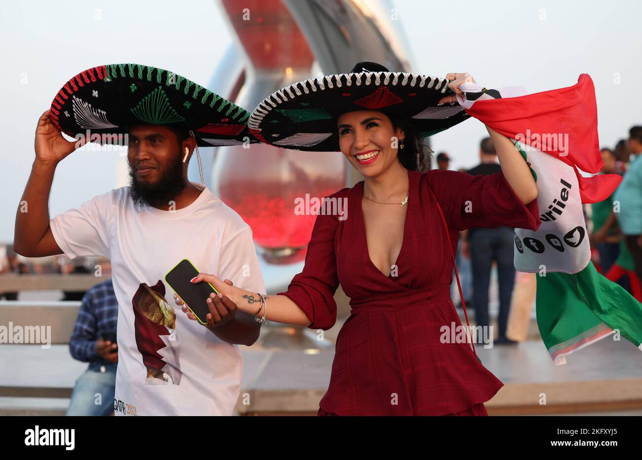 Doha, Qatar. 20th Nov, 2022. Fans celebrate for the opening day of 2022 Qatar FIFA World Cup at ...
