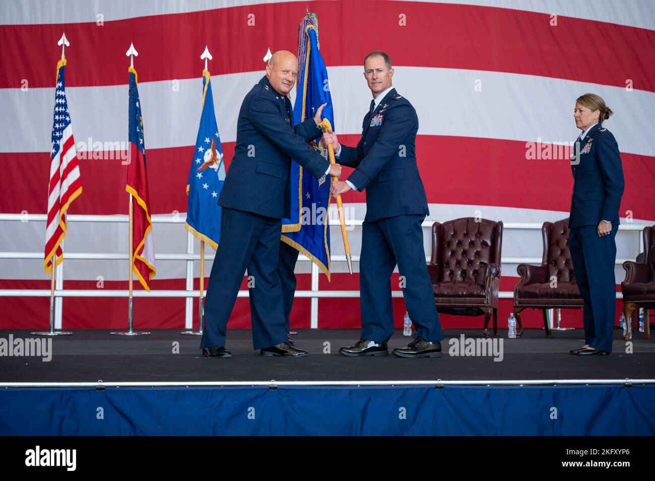 U.S. Air Force Col. Christopher Dunlap, center, incoming commander of ...