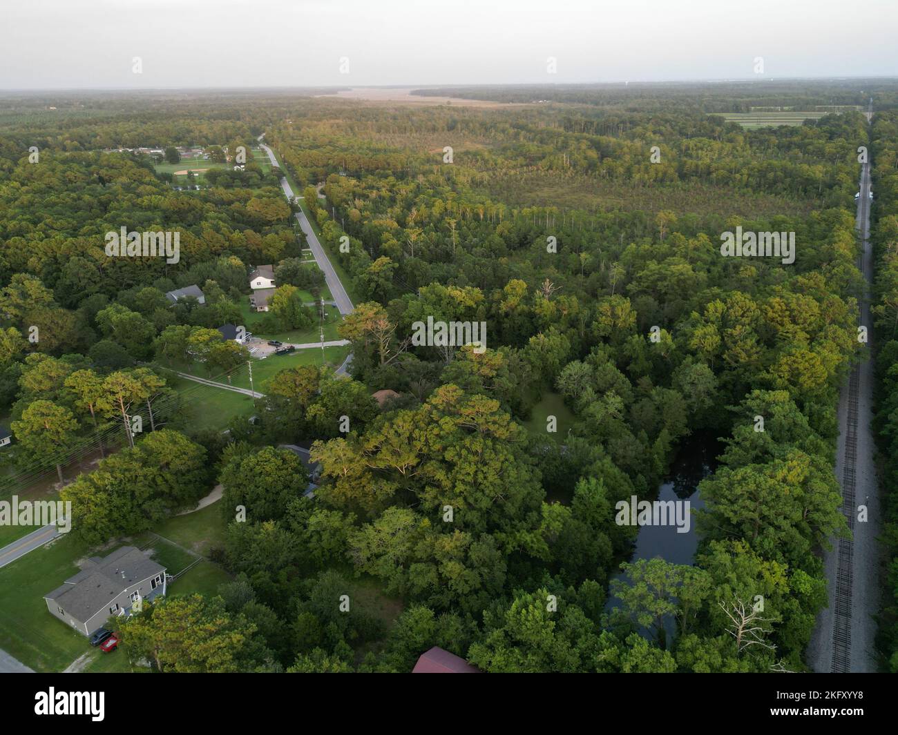 An aerial shot of a neighborhood in coastal Carolina in bright weather ...