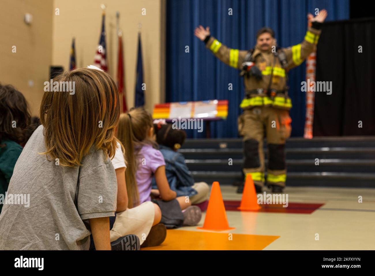 A student from Tarawa Terrace Elementary School watches firefighters ...