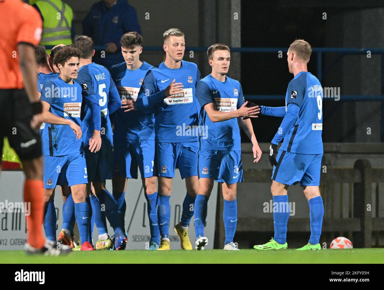 Dender's players celebrate after scoring during a soccer match between ...