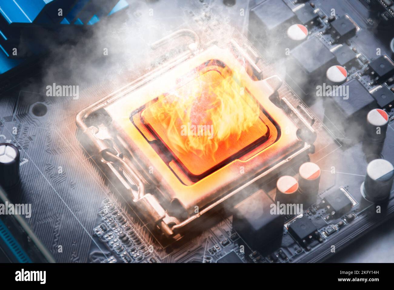Flames ignite the computer processors on the motherboard and smoke ...