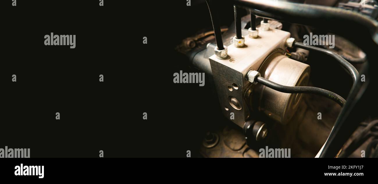 ABS unit module control box with pipes of a car brake system with ...