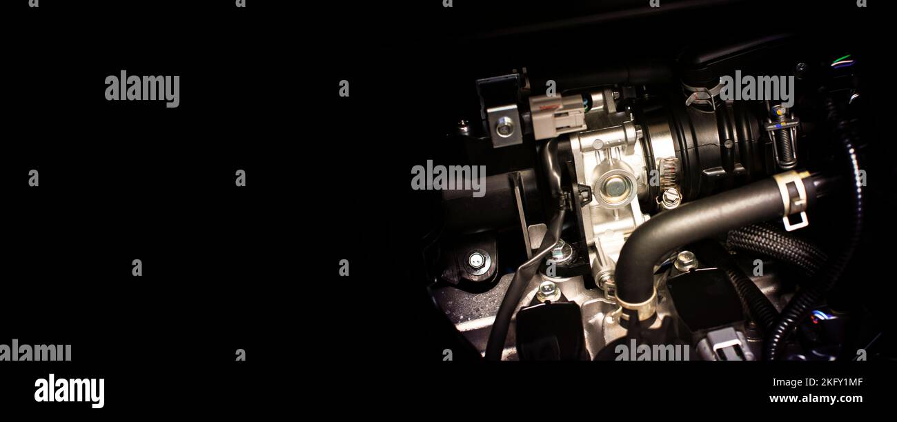 Close up of throttle body of engine drive system in a car with ...