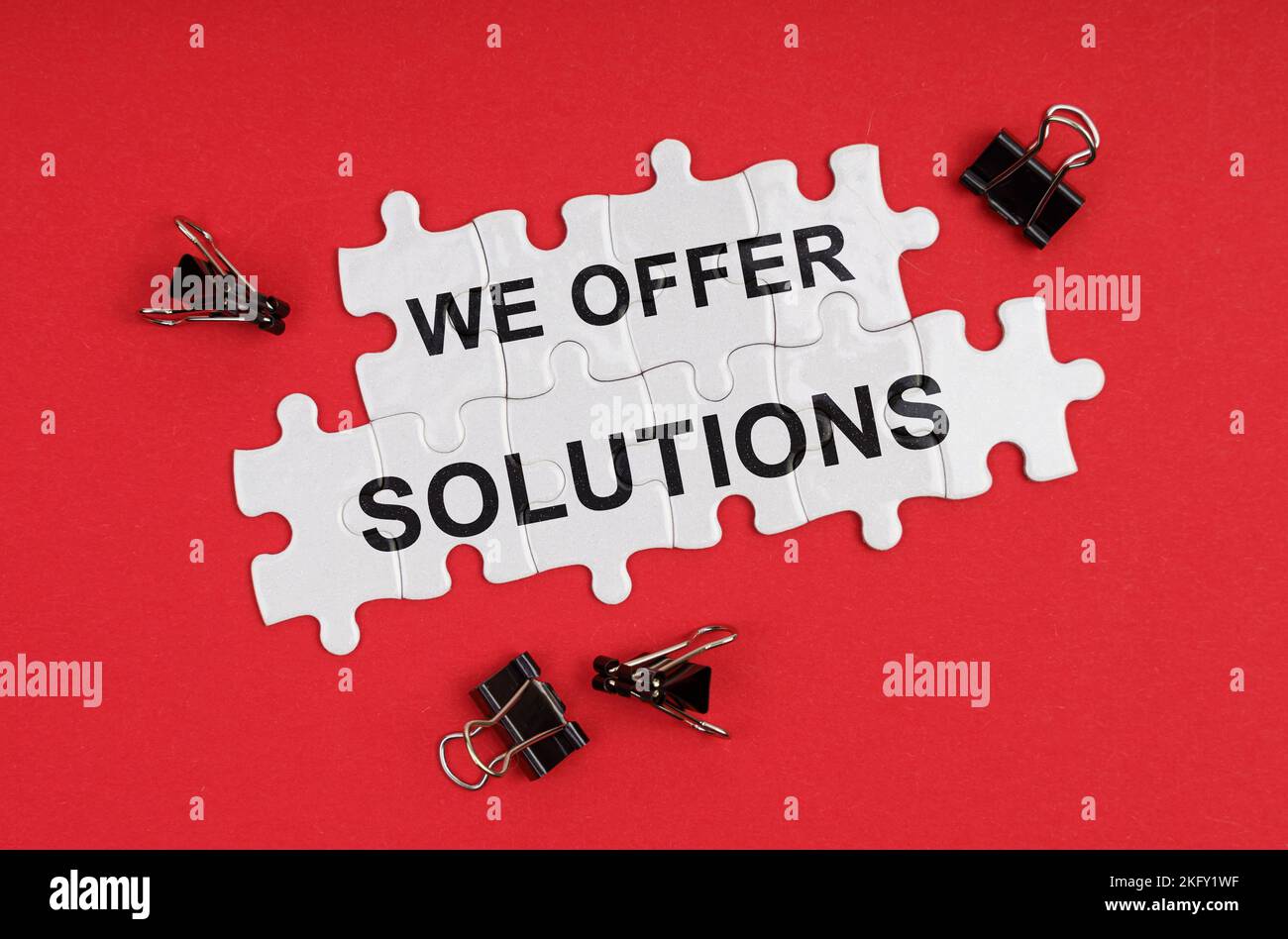 Business and Economics. On a red background, there are puzzles with the ...