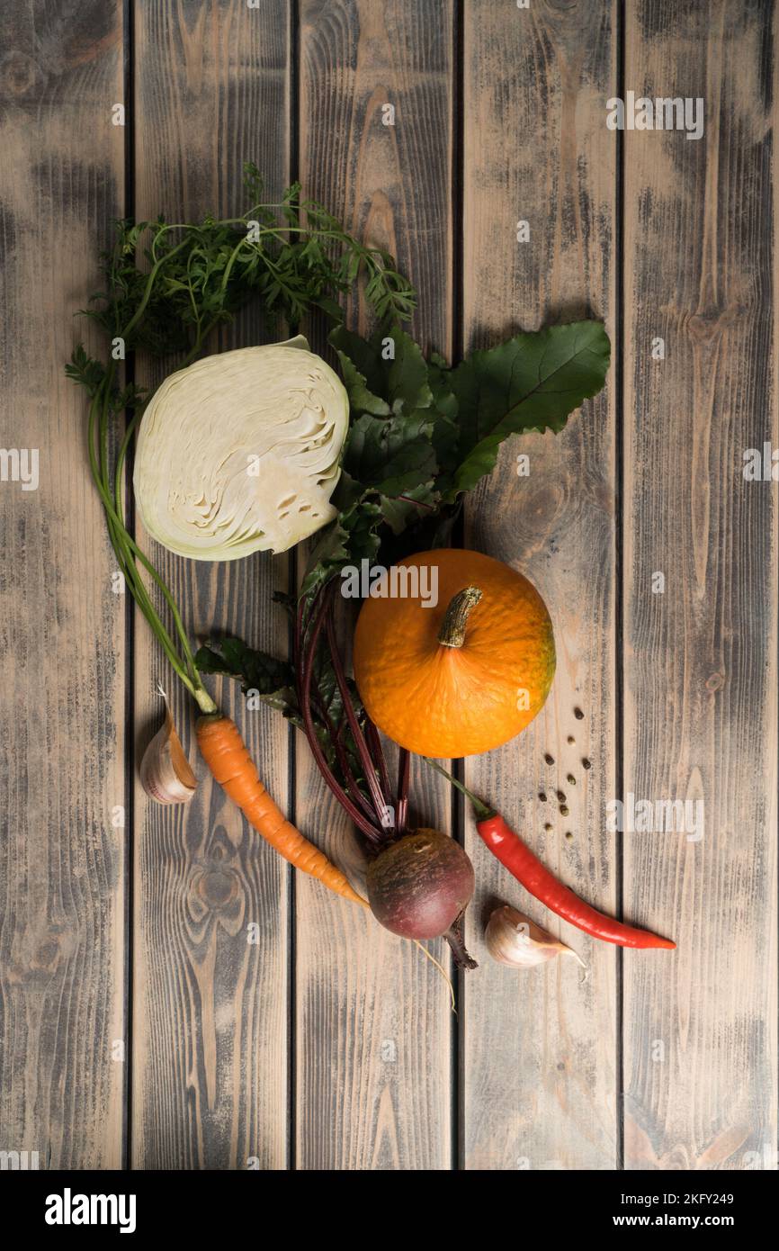 Vertical food composition of onion, cabbage, beet root, chili pepper ...