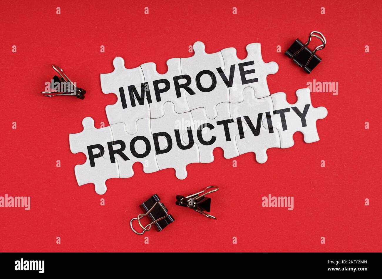 Business and Economics. On a red background, there are puzzles with the ...