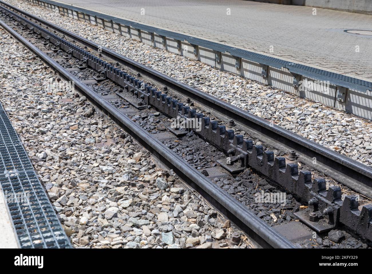Selective focus, diagonal view of trail tracks in the Swiss alps. The ...