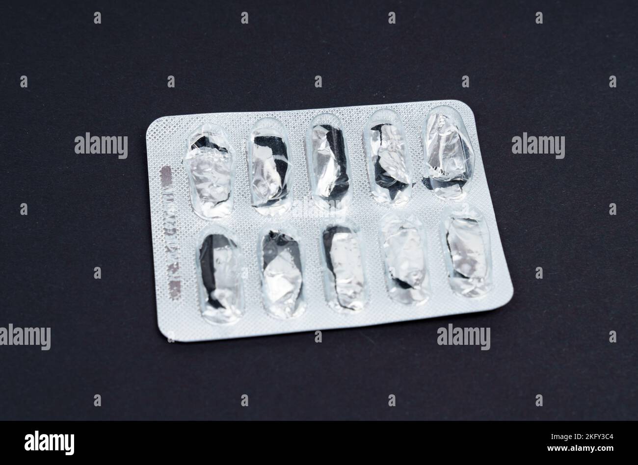 Medicine concept. On the black surface is an empty pill pack Stock ...