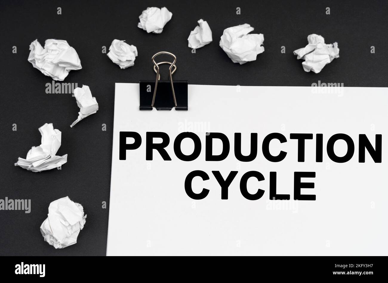 Industrial concept. On a black background, there are crumpled pieces of ...