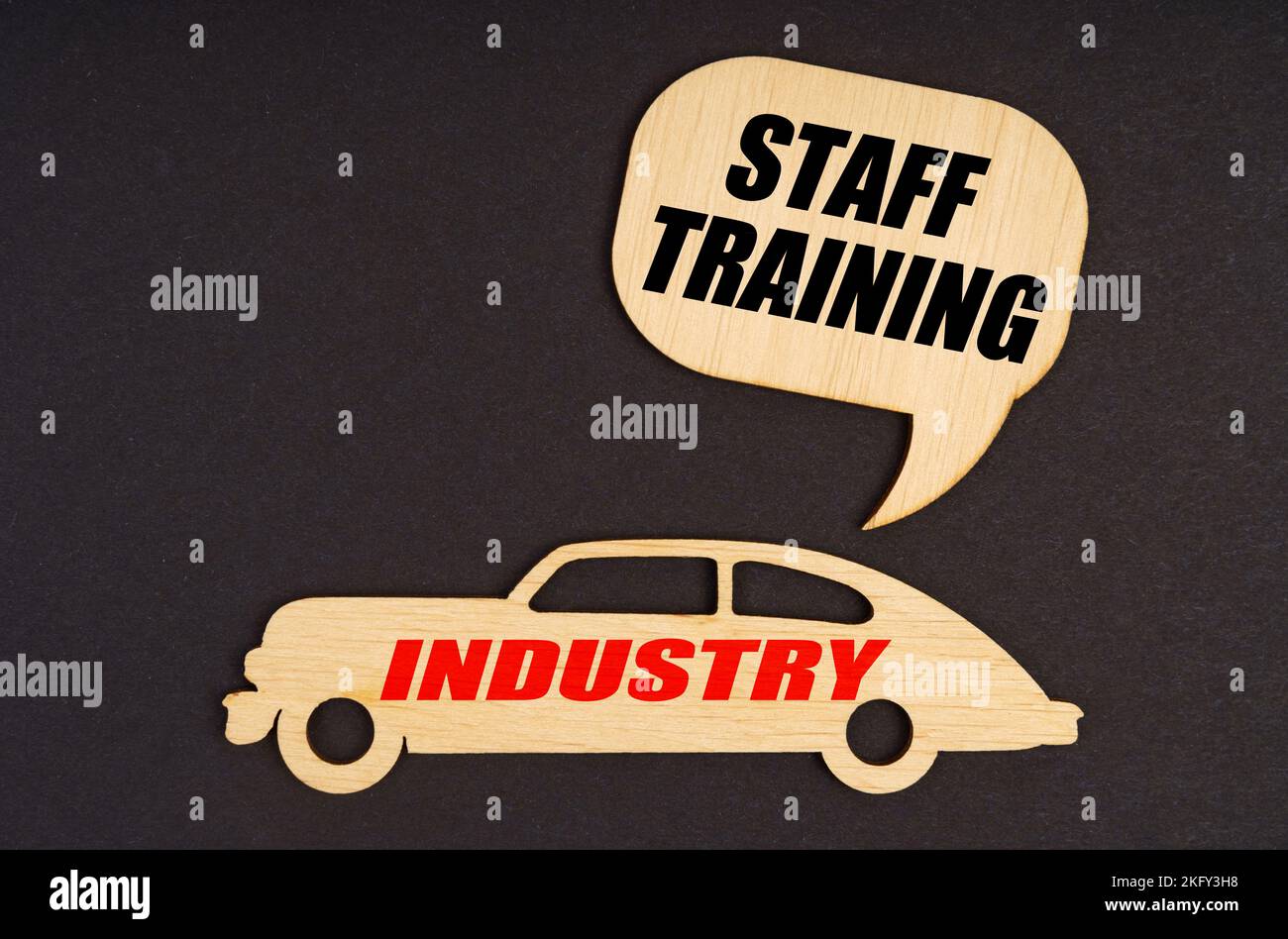 Industry concept. On a black background, a car with the inscription ...