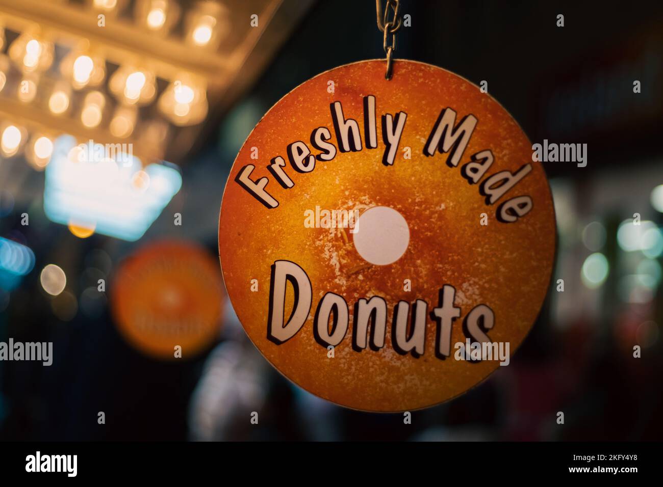 A closeup of a Freshly Made Donuts sign at Loughborough Fair Stock ...