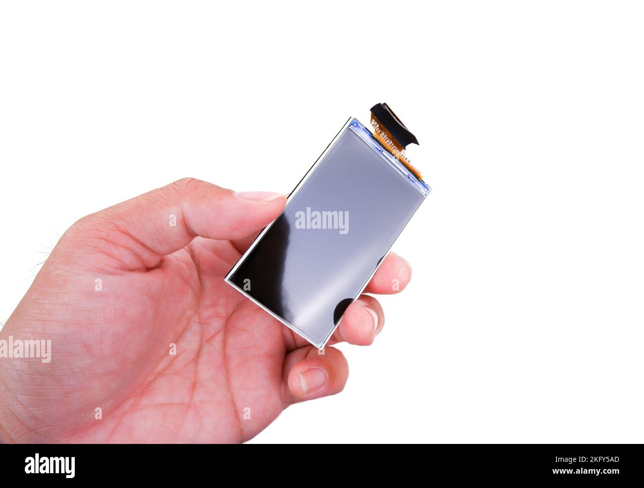 LCD screen for smartphone or small appliances in a hand on white ...