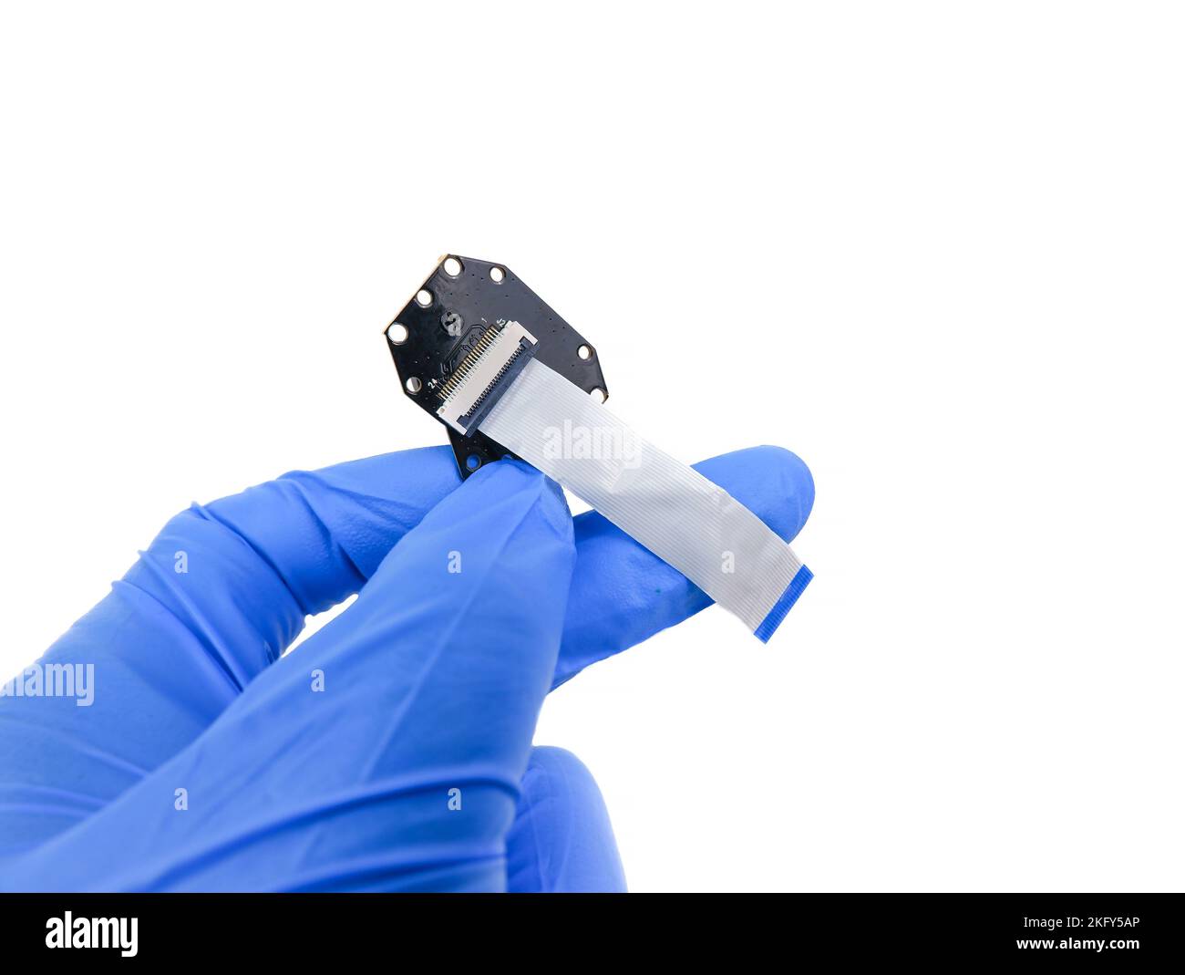 Ribbon cable 24 PIN for circuit board connection on a technician hand ...