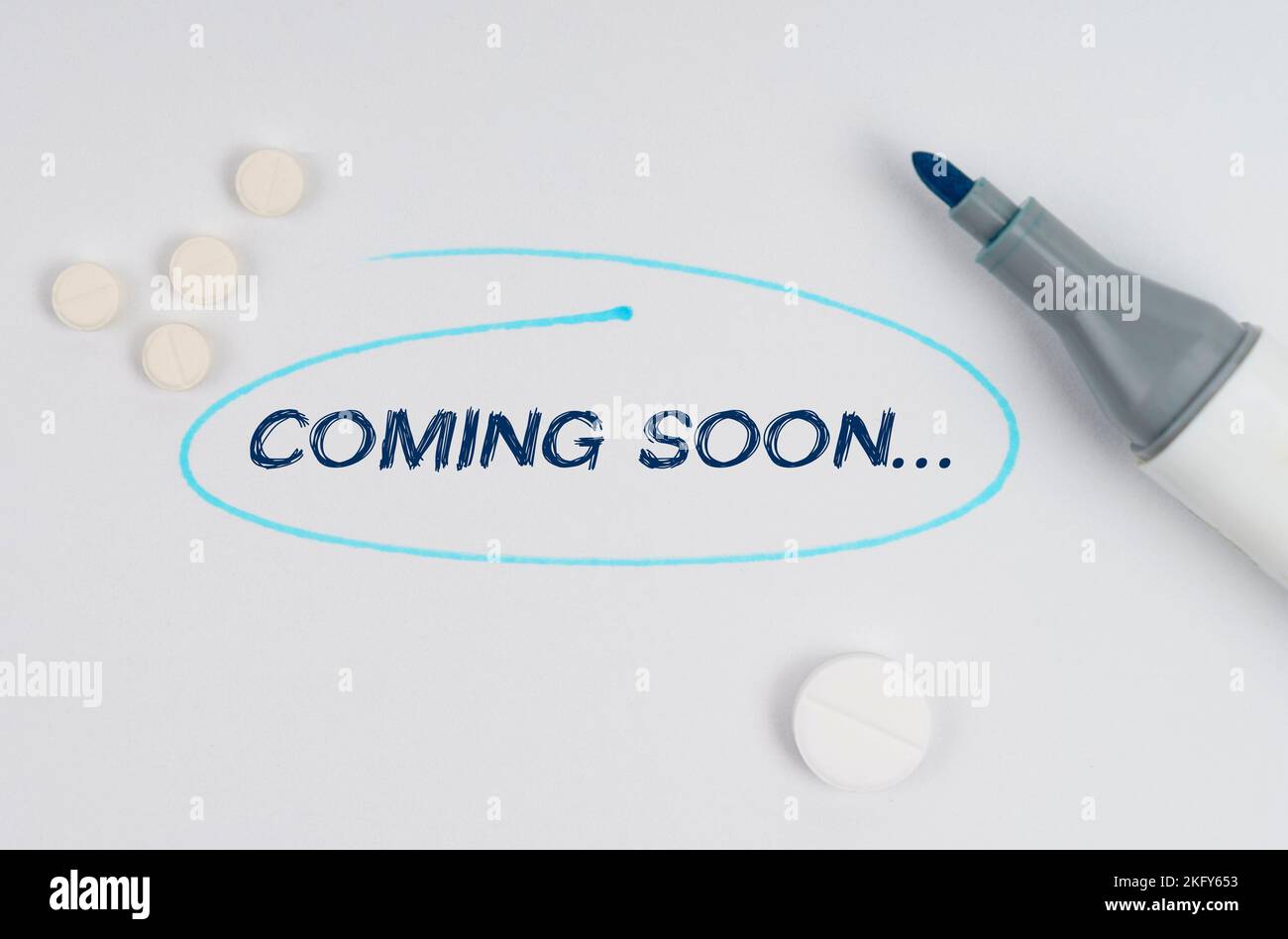 Medicine and healthcare concept. On a white sheet of paper, tablets, a ...