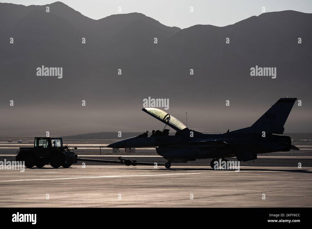 An F-16 Fighting Falcon gets towed during a Load Crew of the Quarter ...
