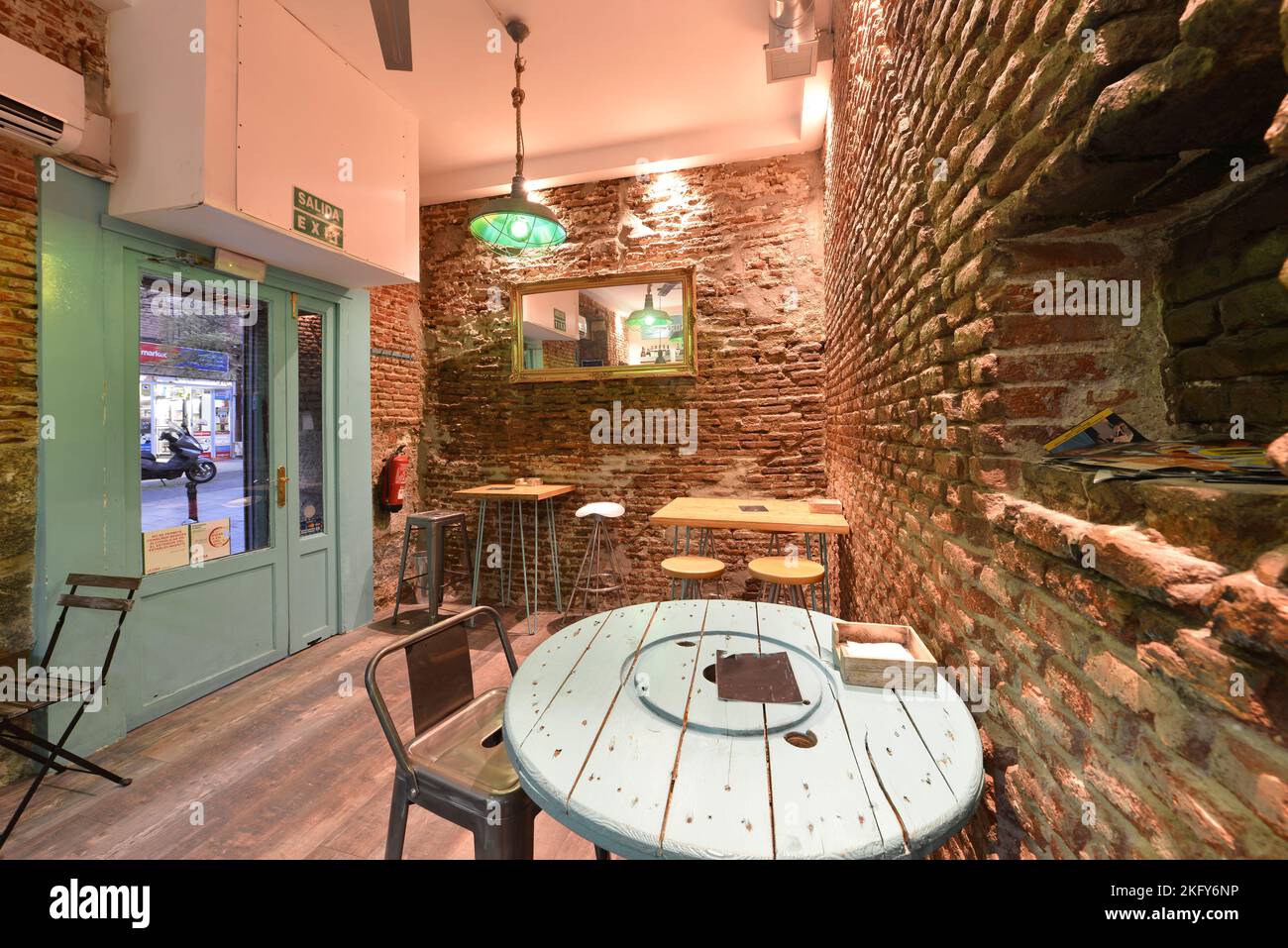 Wooden restaurant table painted in sky blue chalk color lots of ...