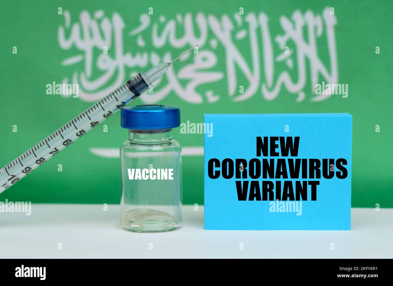 Medicine concept. Vaccine, syringe and blue plate with the inscription ...