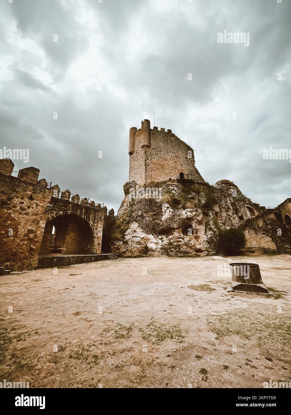 A vertical of the Castle of Monleon on a hill in Spain Stock Photo - Alamy