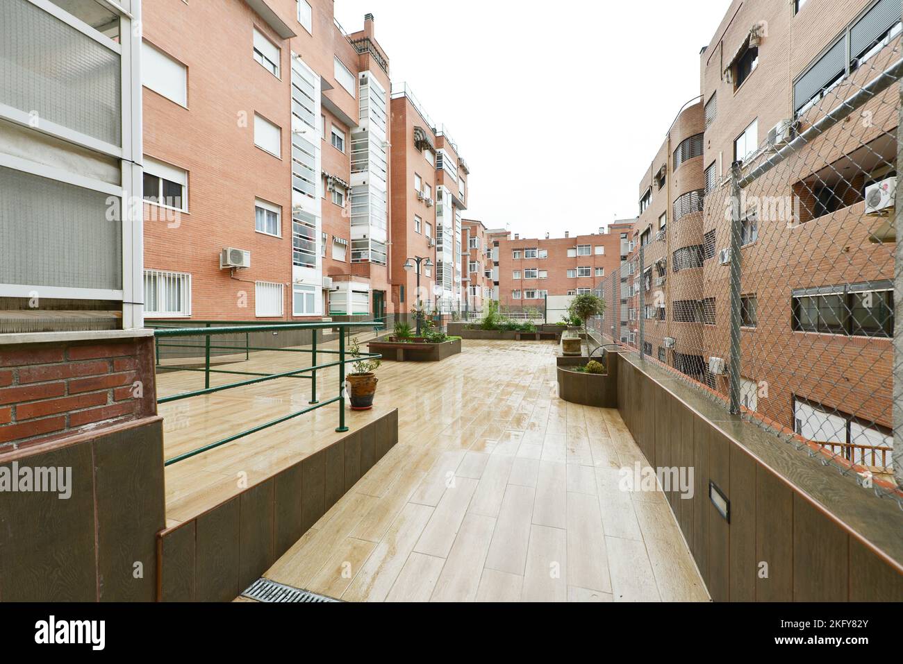 Facades of residential buildings with access from a corridor with metal ...