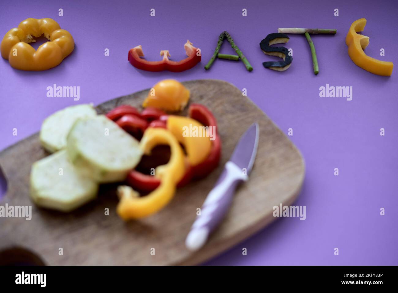 formation of the word zero waste with pieces of vegatal next to a ...