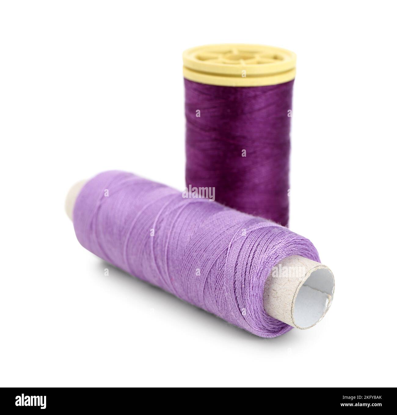 Colorful sewing thread spools on white background Stock Photo - Alamy