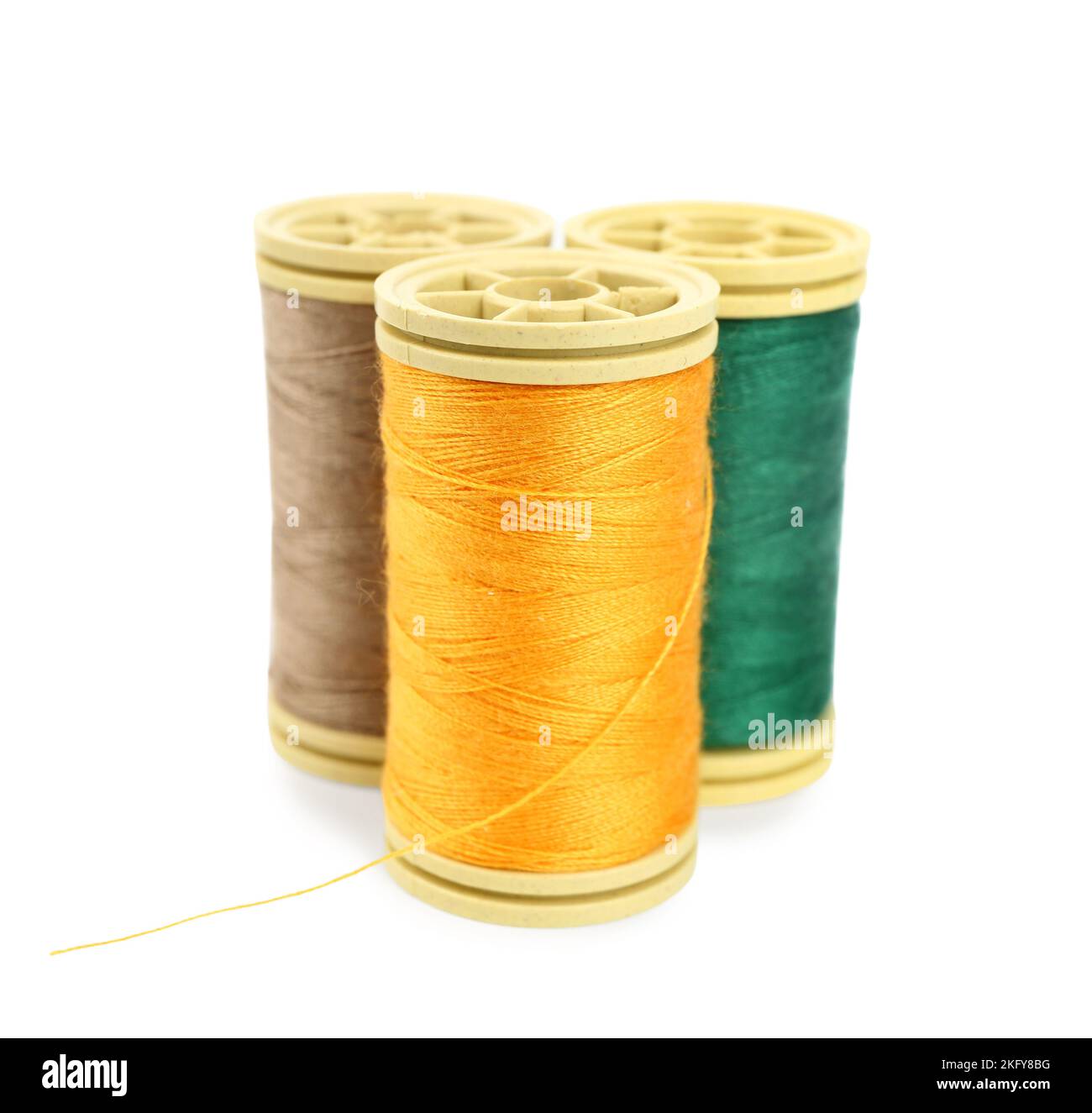Sewing thread spools isolated on white background Stock Photo - Alamy
