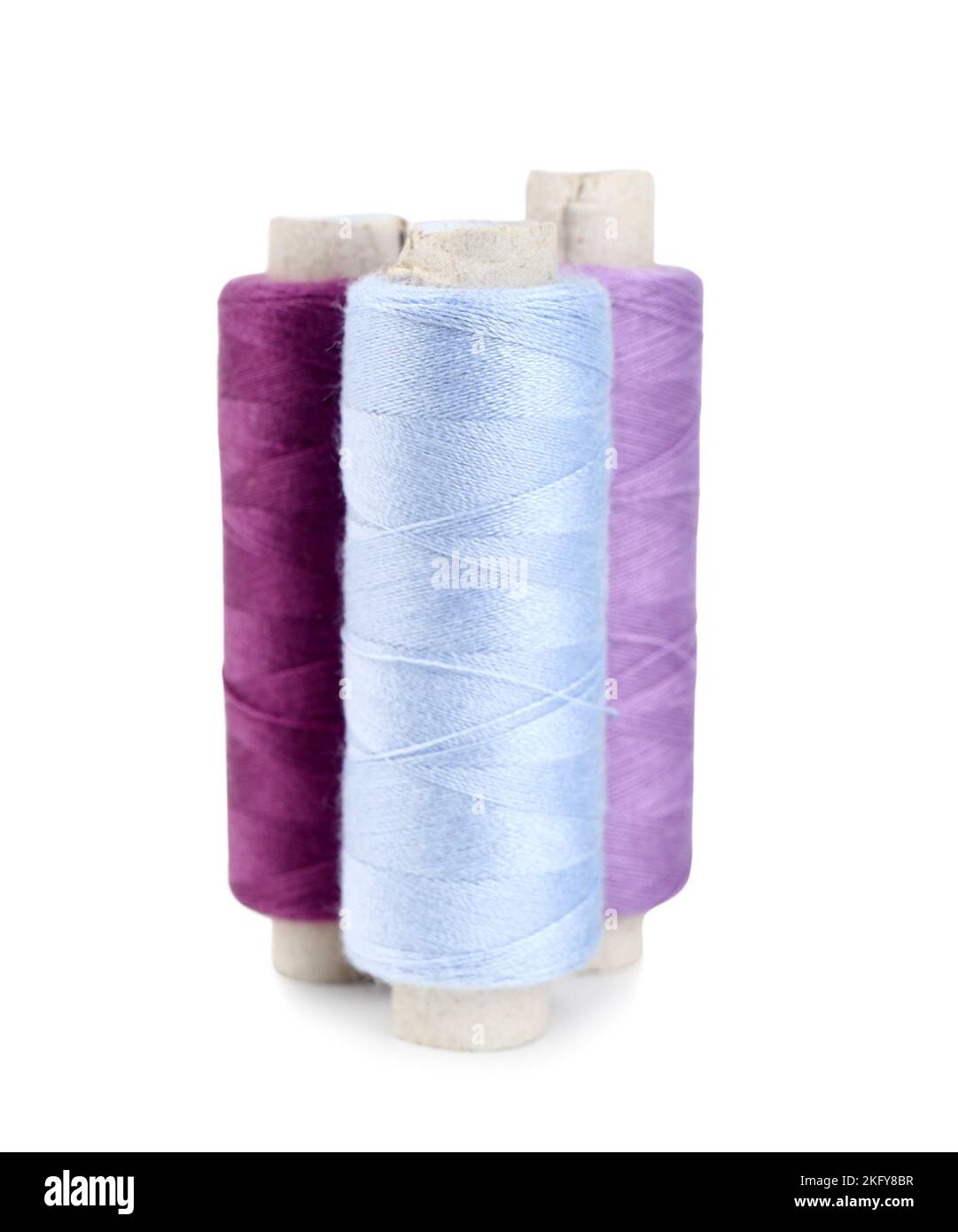 Colorful thread spools isolated on white background Stock Photo - Alamy