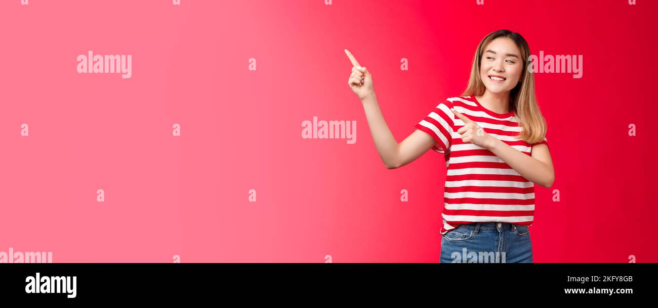 Happy relaxed good-looking outgoing modern urban korean blond girl turn ...