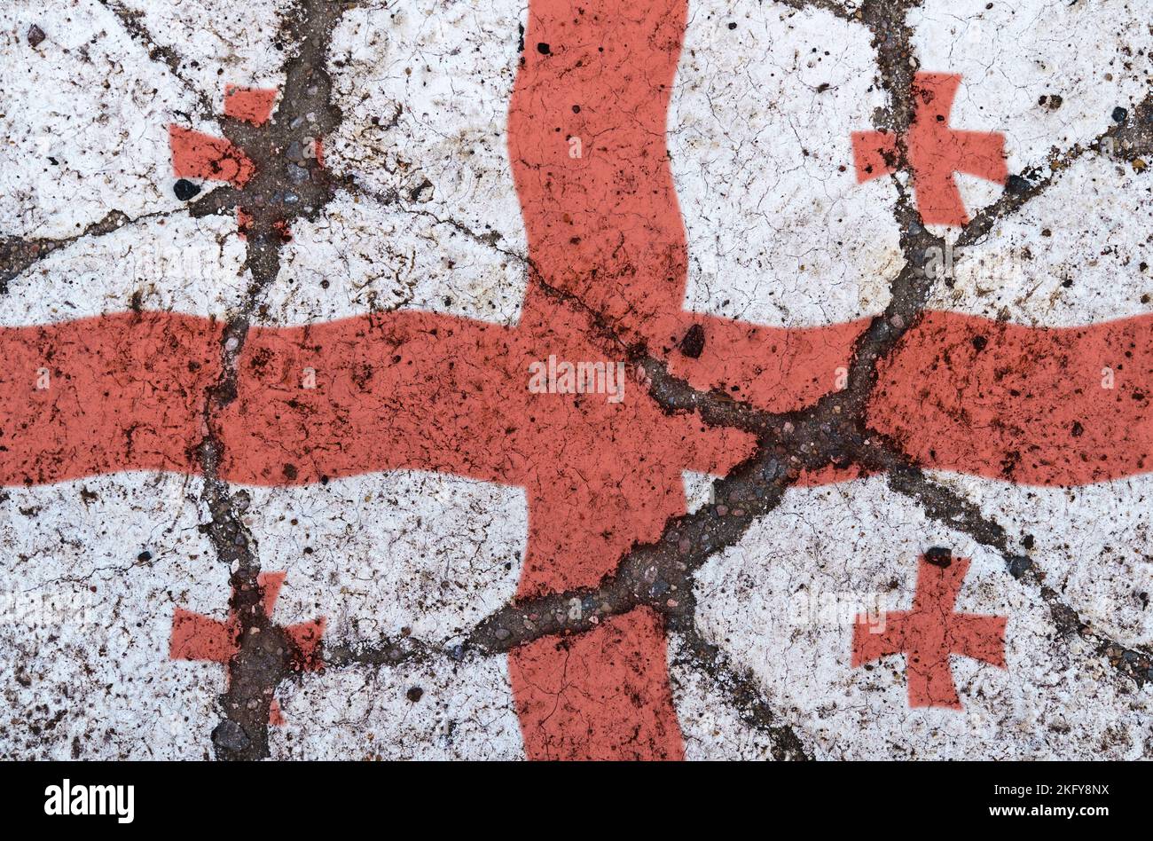 Flag of Georgia on the cracked asphalt. The concept of crisis, default ...