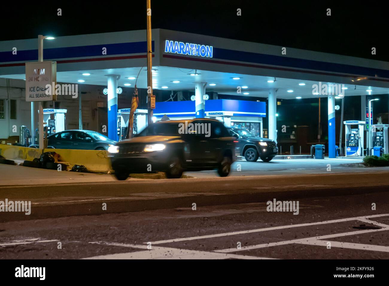 The Marathon gas station at night Stock Photo - Alamy