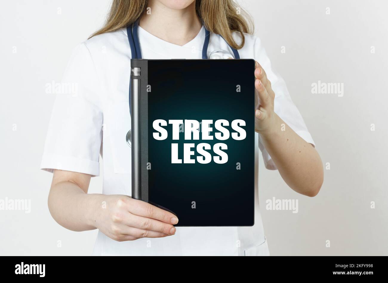 Medicine and health concept. The doctor is holding a tablet with the ...