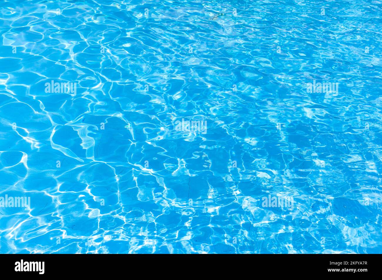 Water background, ripple and flow with waves. Summer blue swiming pool ...