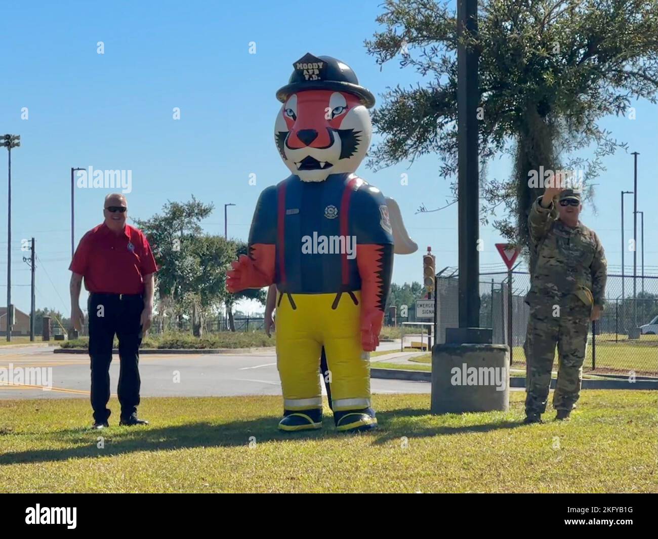 Mr. Phillip Clark, 23rd Civil Engineer Squadron fire inspector, left ...