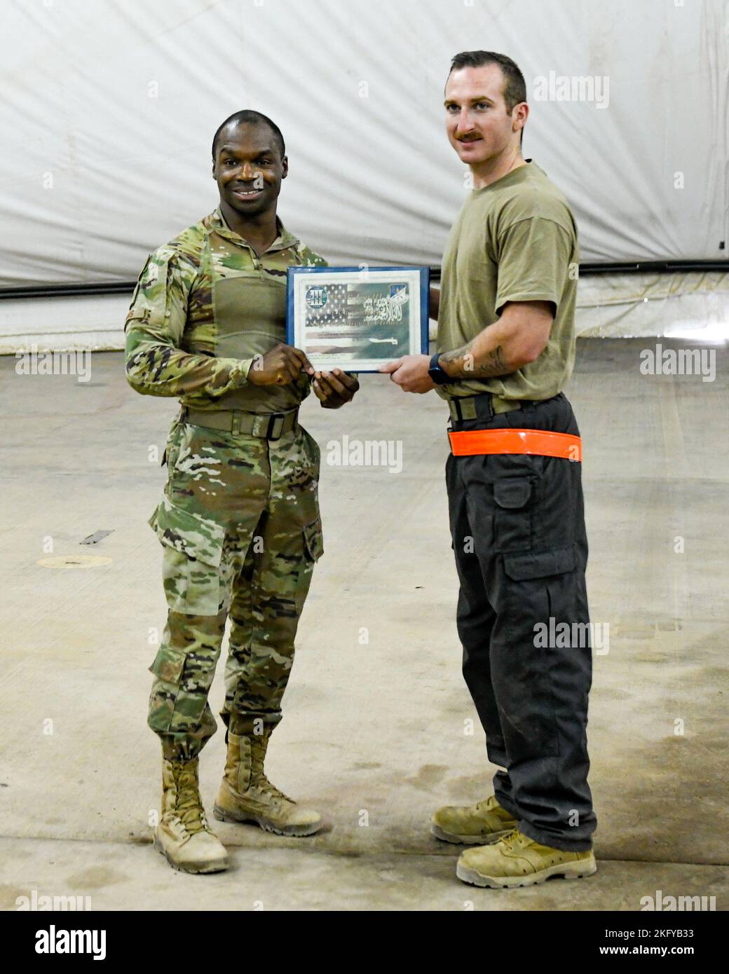 U.S. Air Force Tech. Sgt. Allen Adams awards the Top III Association of ...