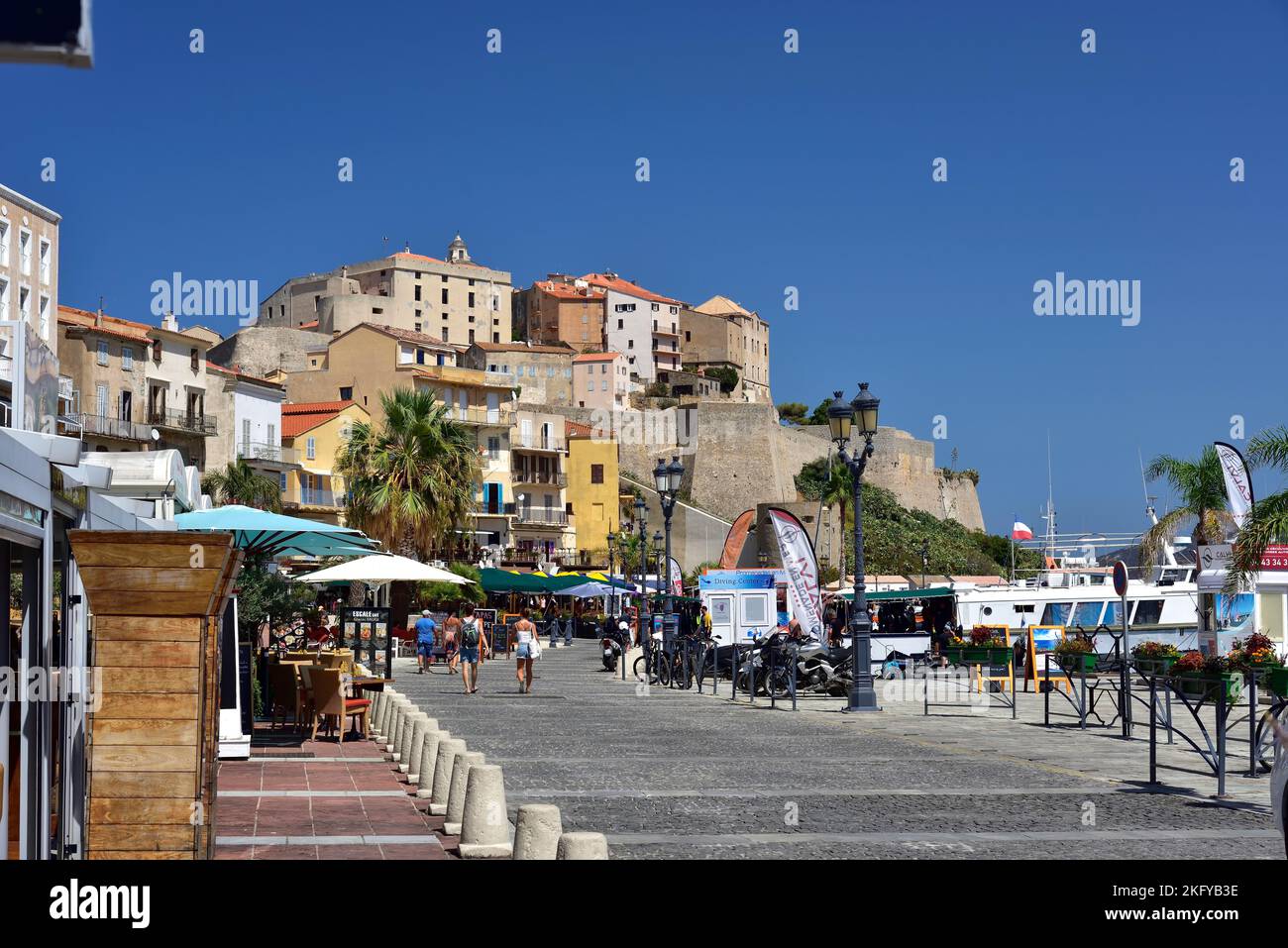CALVI, CORSICA, FRANCE; August 21, 2020: Tourists walking in center of ...