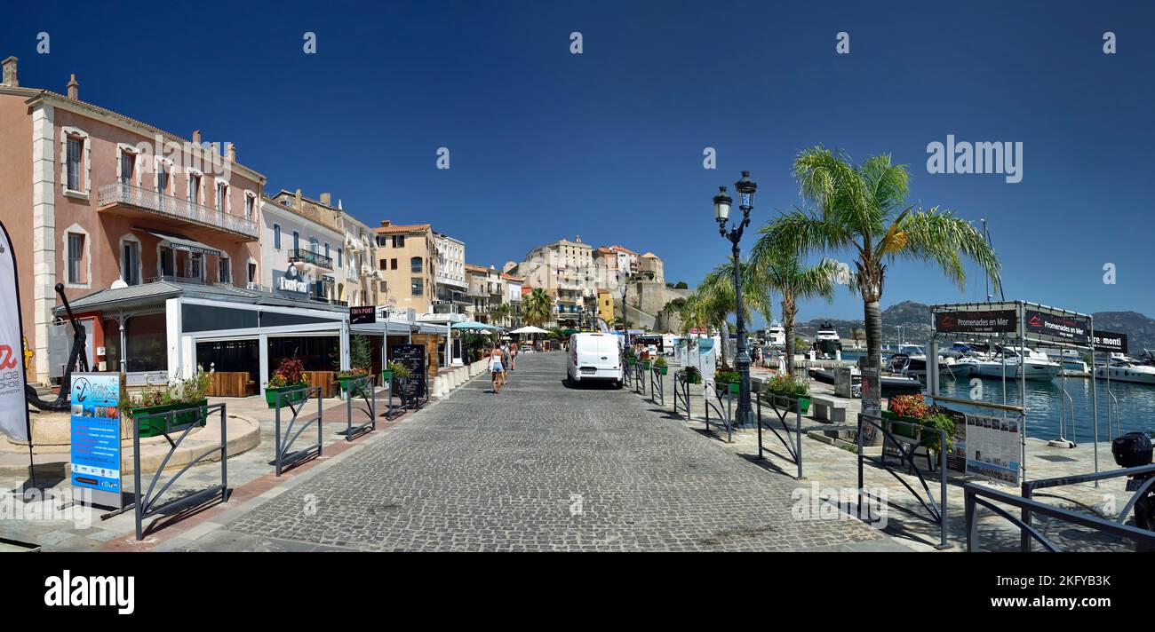 CALVI, CORSICA, FRANCE; August 21, 2020: Tourists walking along the ...