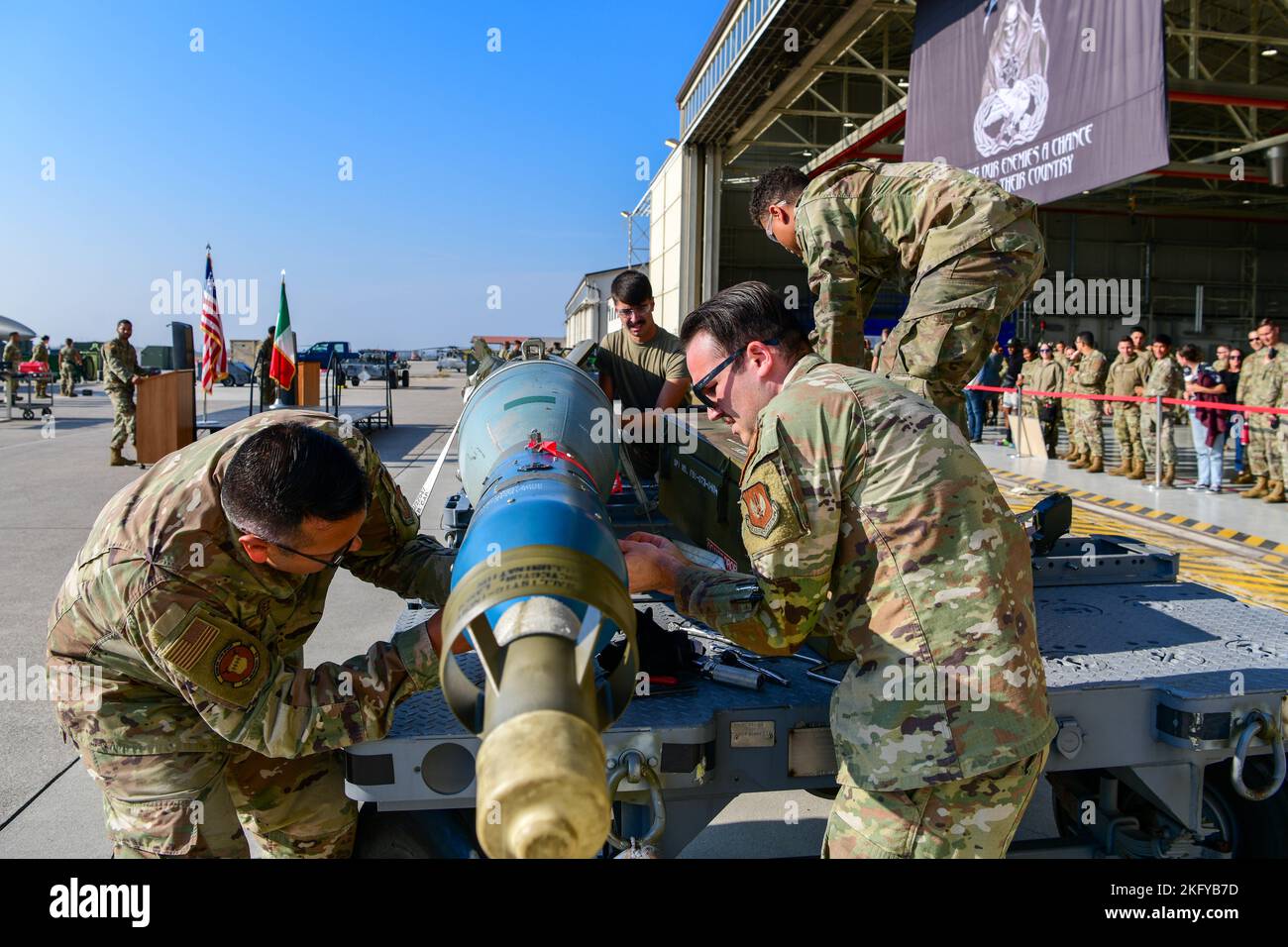 U.S. Air Force Airmen assigned to the 31st Munitions Squadron build an ...